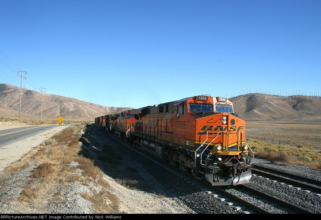 BNSF 7556 leads a manifest past Monolith.